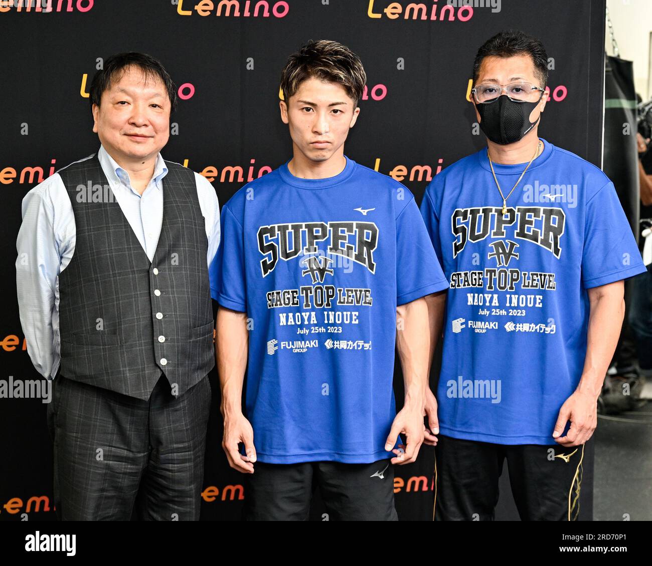 Naoya Inoue of Japan, center, poses for a photo session with his ...