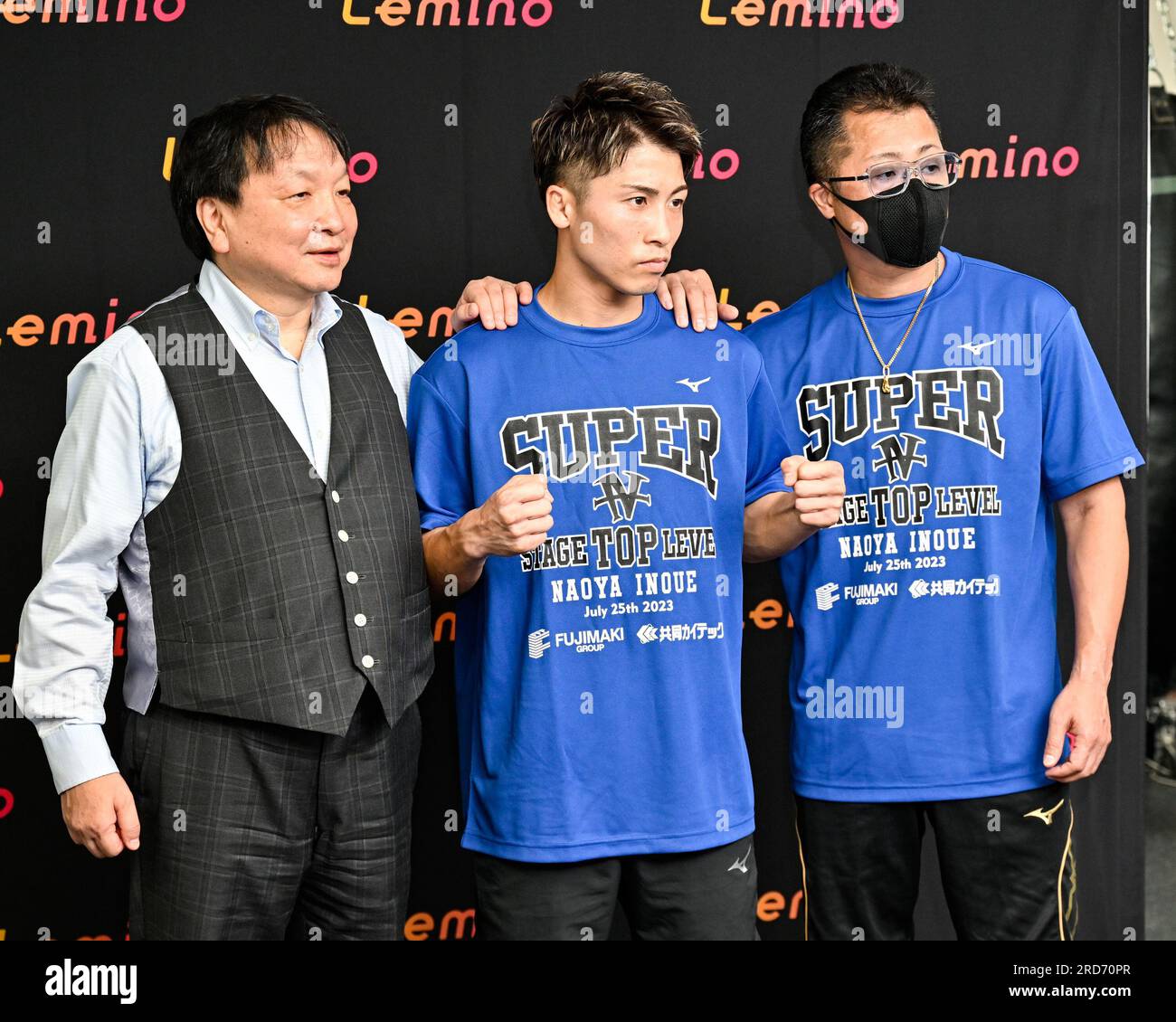 Naoya Inoue of Japan, center, poses for a photo session with his ...