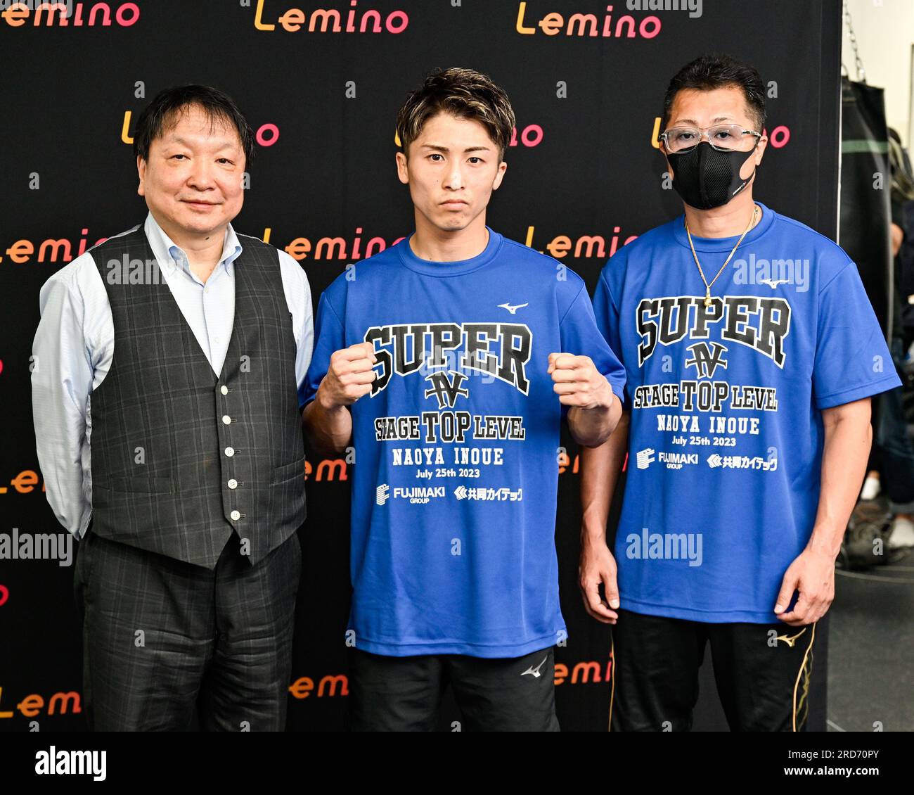 Naoya Inoue of Japan, center, poses for a photo session with his ...