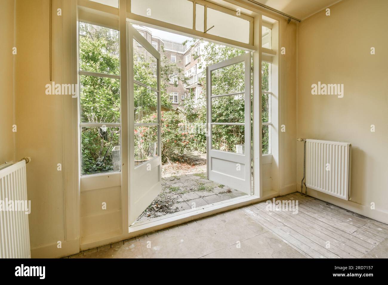 the inside of an empty room with broken windows and debris scattered on ...