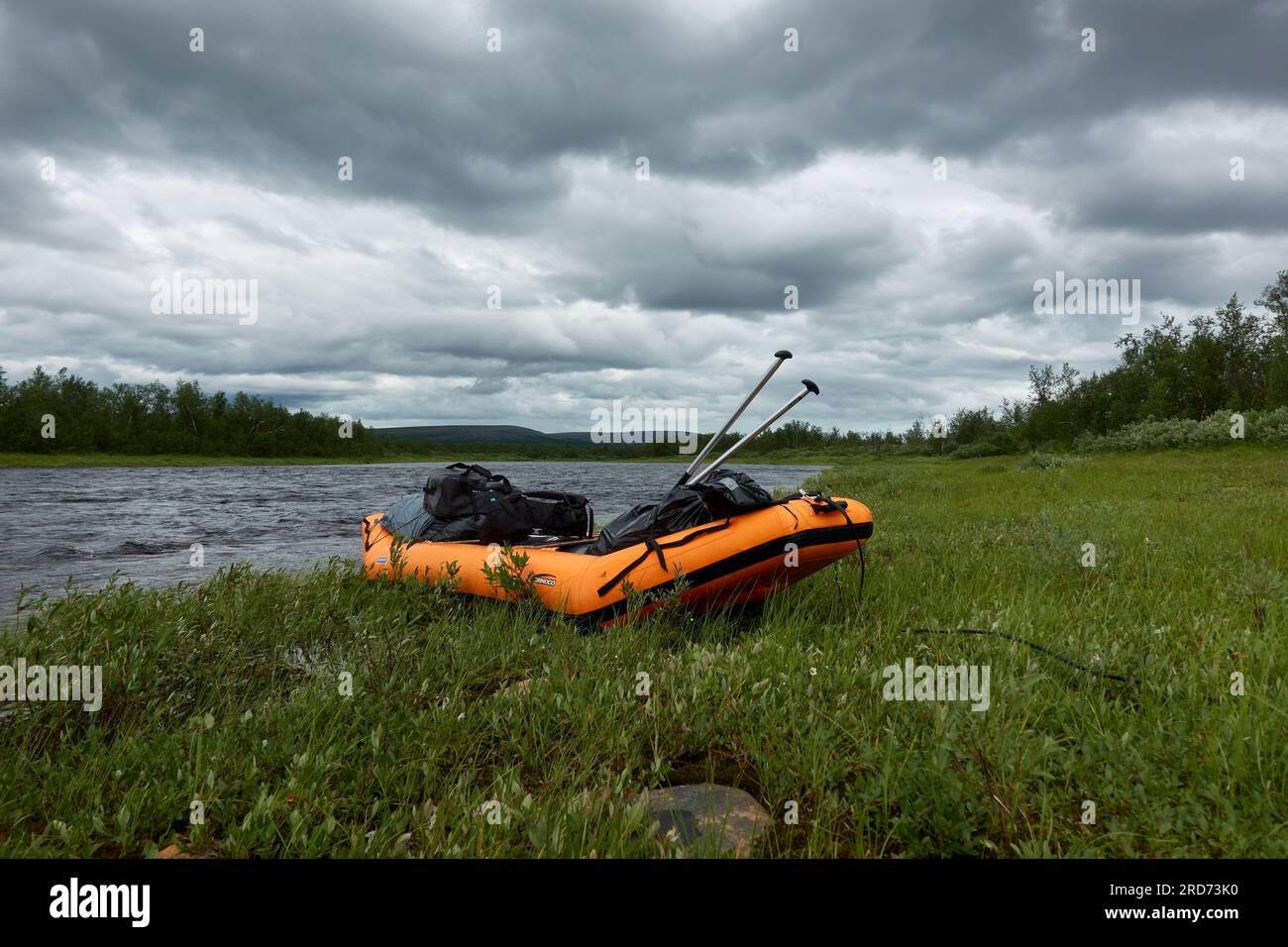 Inflatable Kayak full gear and paddles by Lainio river in Lapland in ...