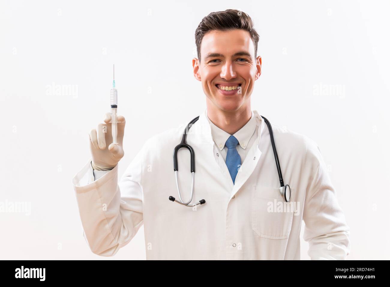Handsome male doctor holding injection hi-res stock photography and ...