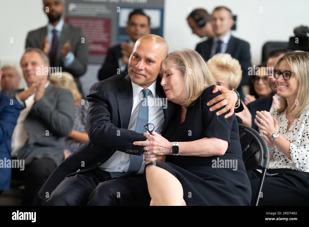 Fellow candidate Mozammel Hossain KC congratulates Councillor Susan ...