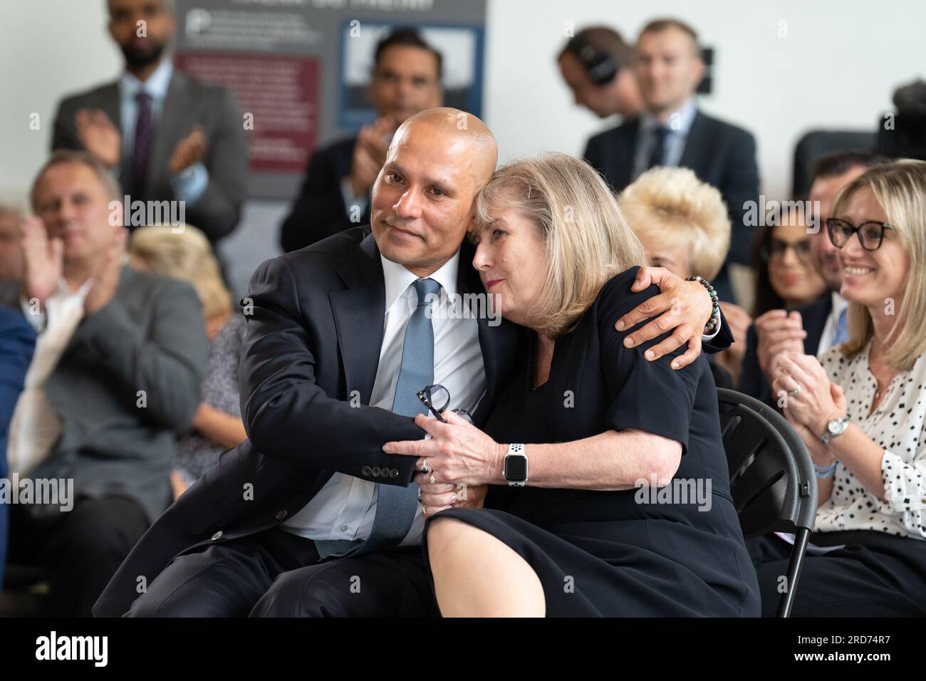 Fellow candidate Mozammel Hossain KC congratulates Councillor Susan ...