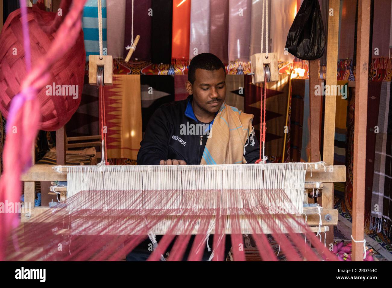 Rug weaver hi-res stock photography and images - Alamy
