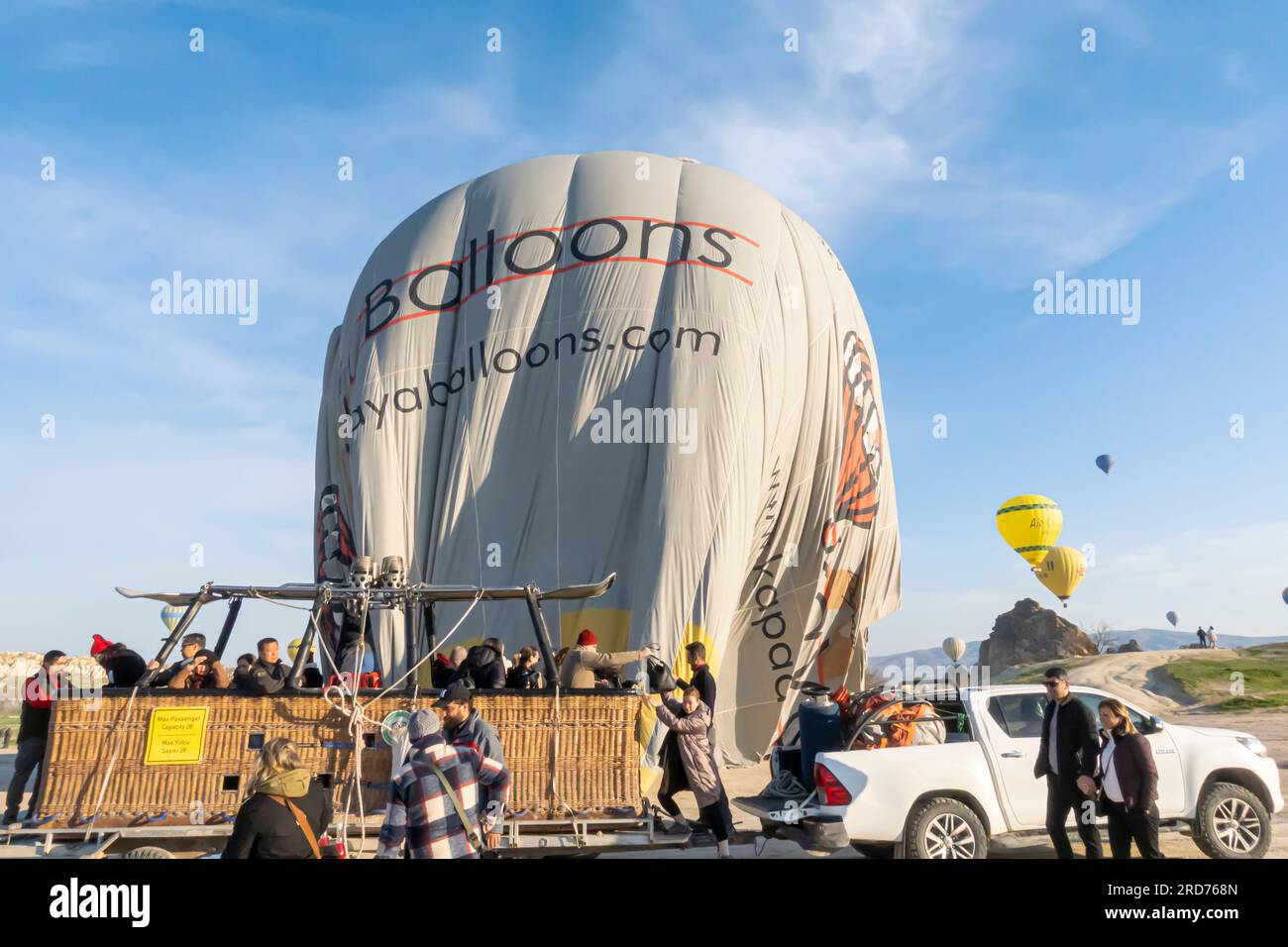 Passengers stepping out the air balloon landed in Cappadocia Turkey ...