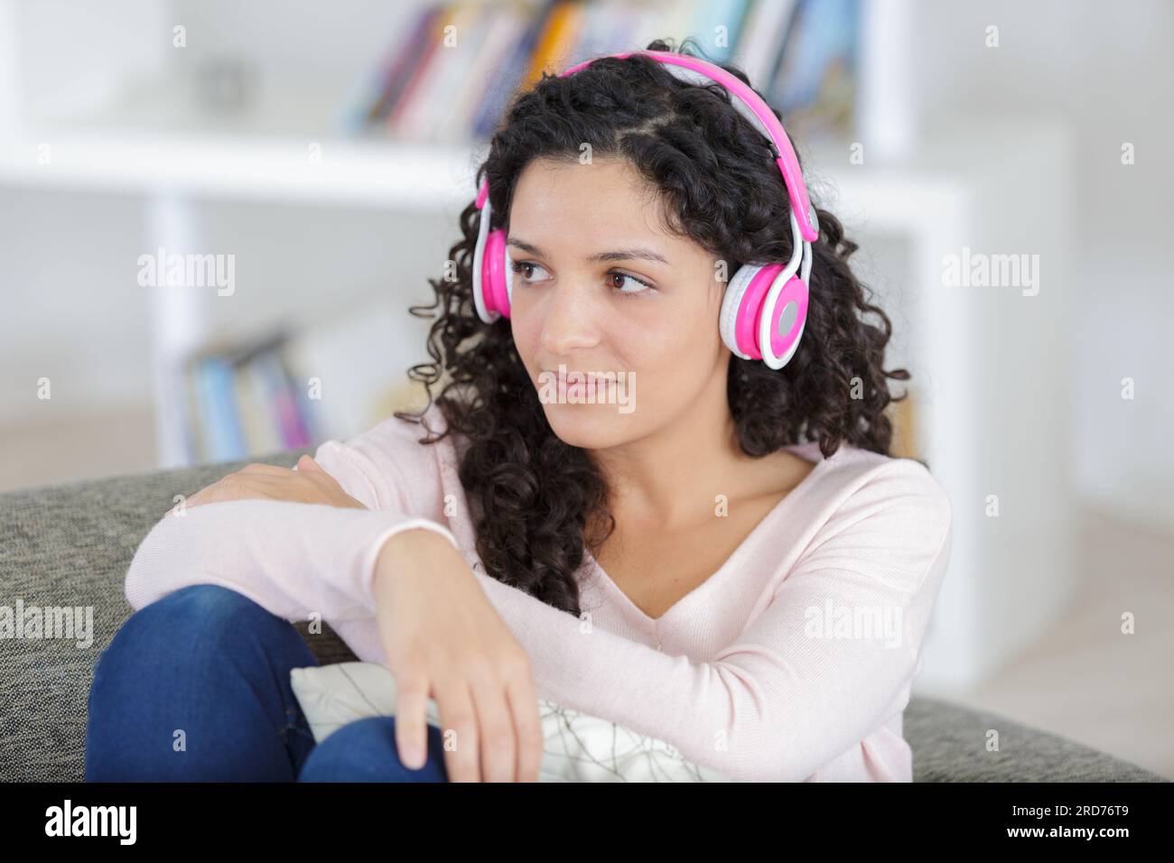 tired woman watching videos on the internet Stock Photo - Alamy