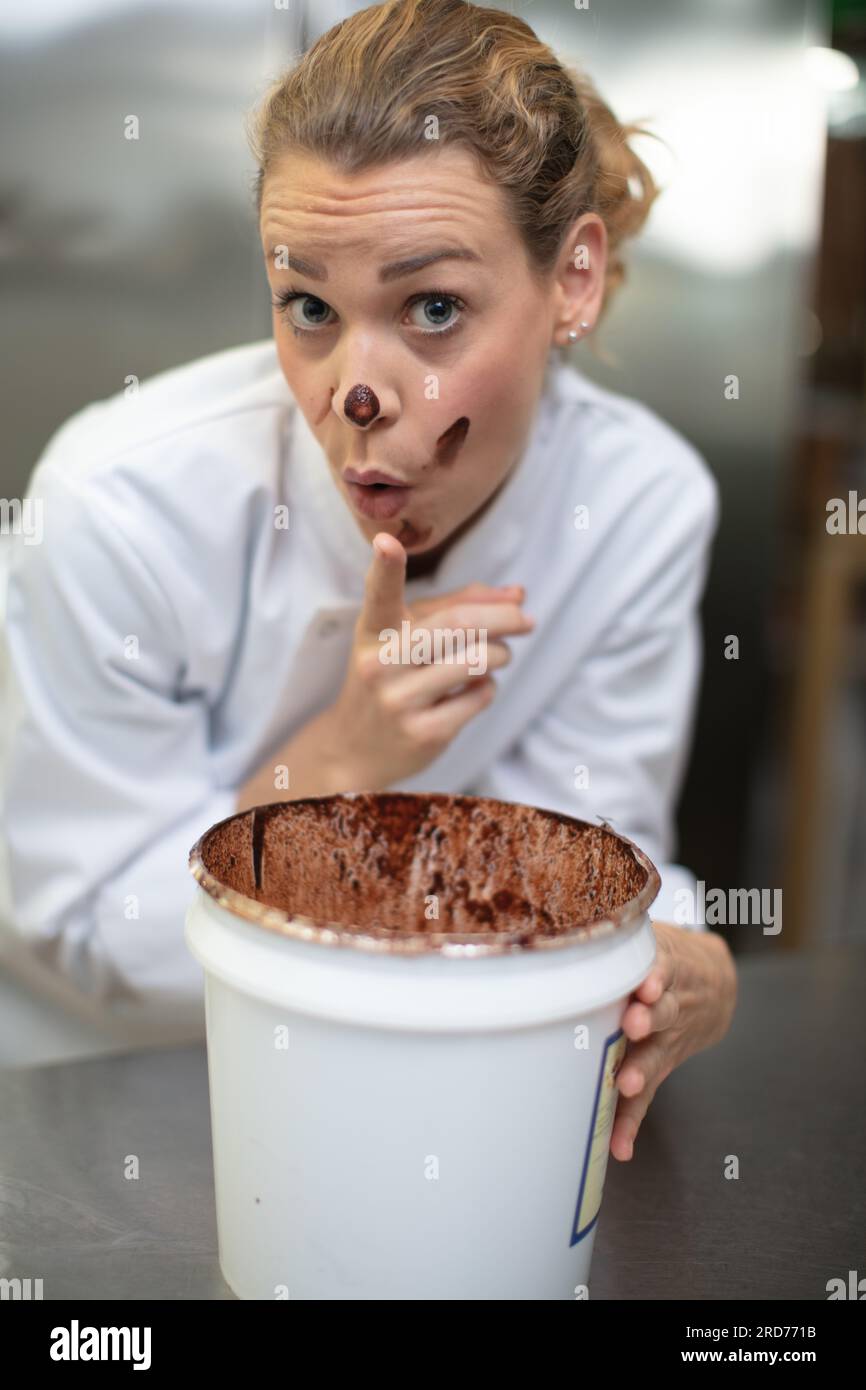 a funny playful female chocolate maker Stock Photo - Alamy