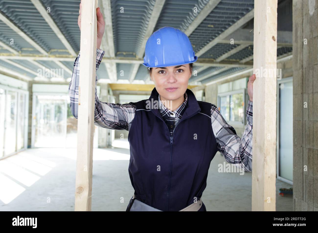 female builder in property under construction Stock Photo - Alamy