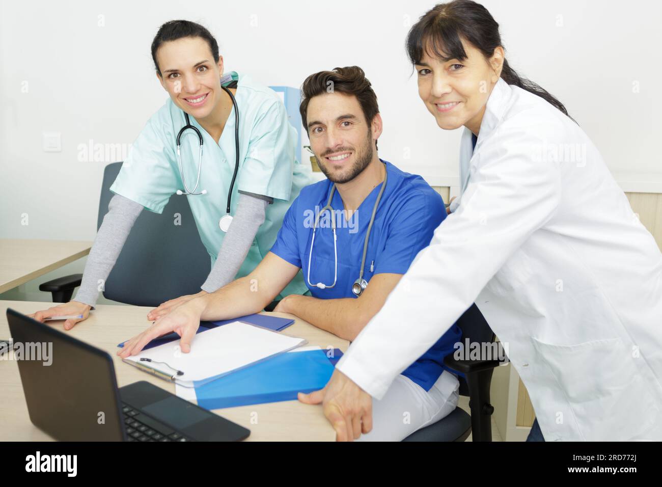 Young positive team doctors hi-res stock photography and images - Alamy
