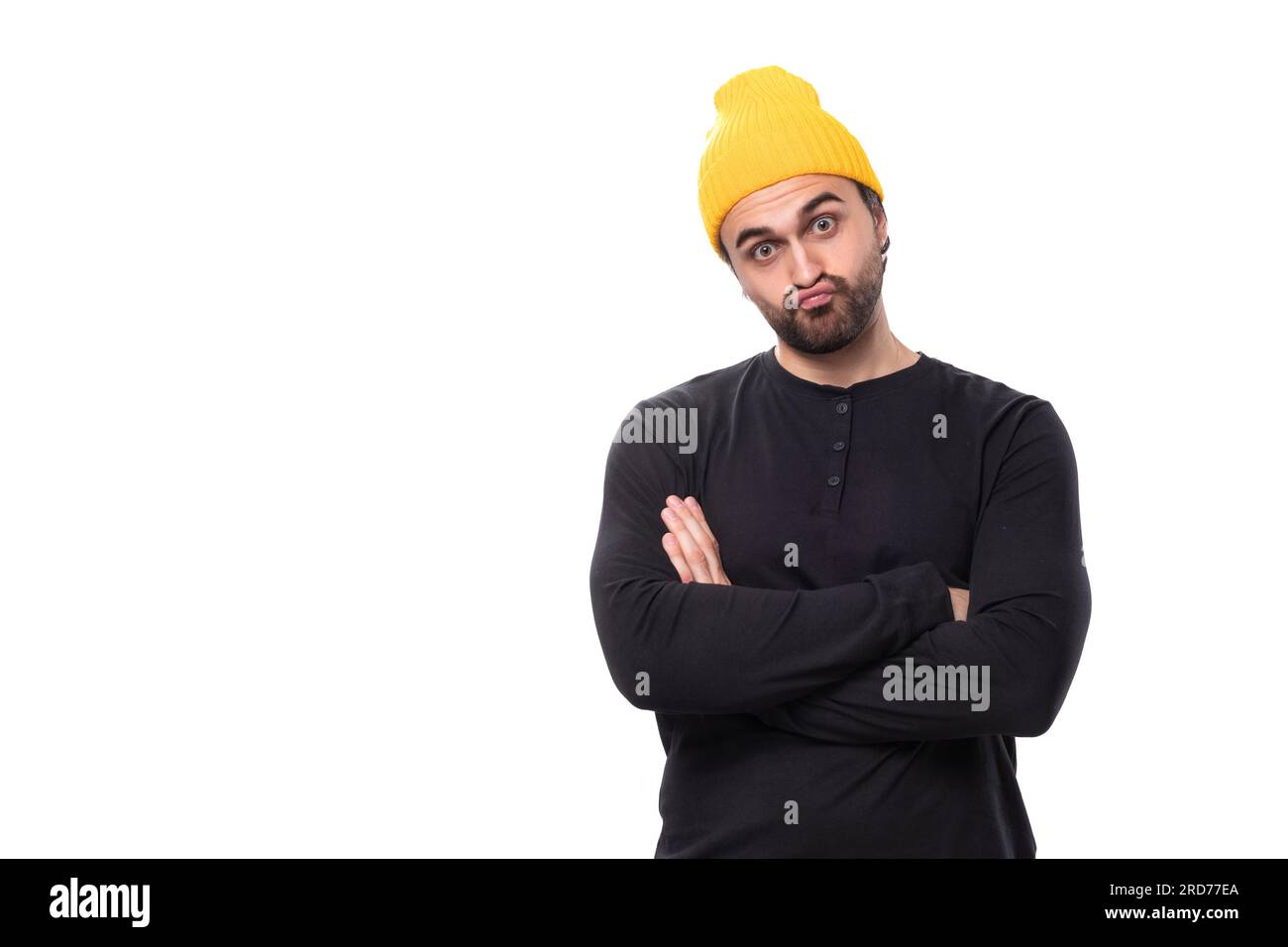 handsome young 30 year old guy with a beard dressed casually looks at ...