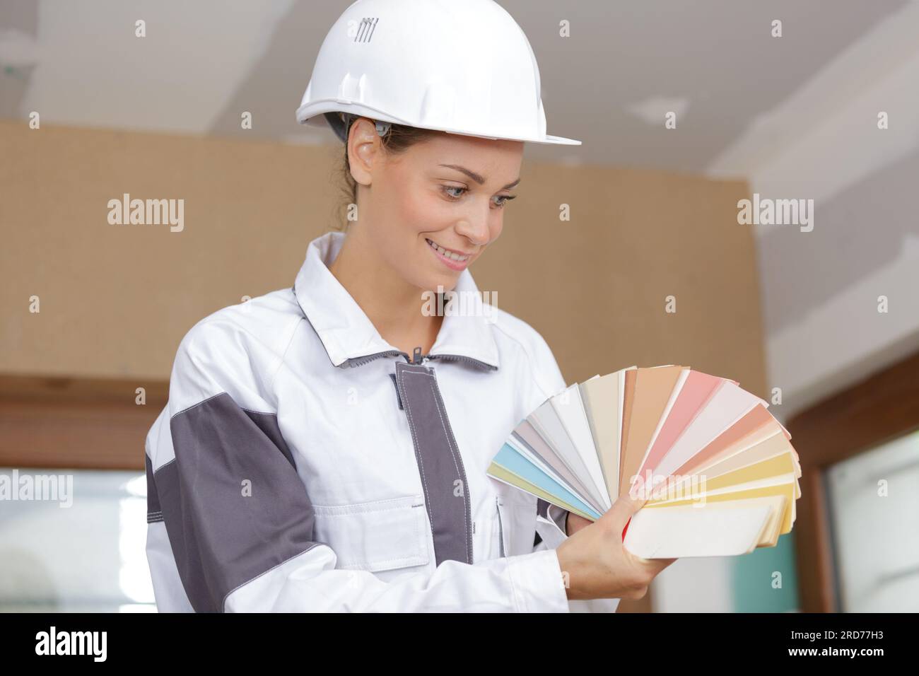 builder picking a color for a house walls Stock Photo - Alamy