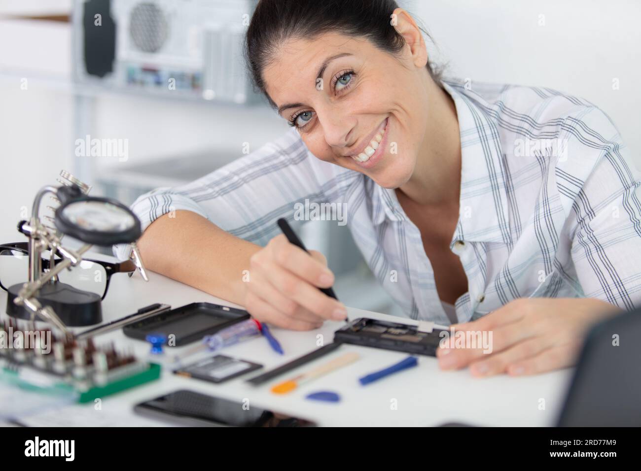 young female digital electronic engineer Stock Photo - Alamy