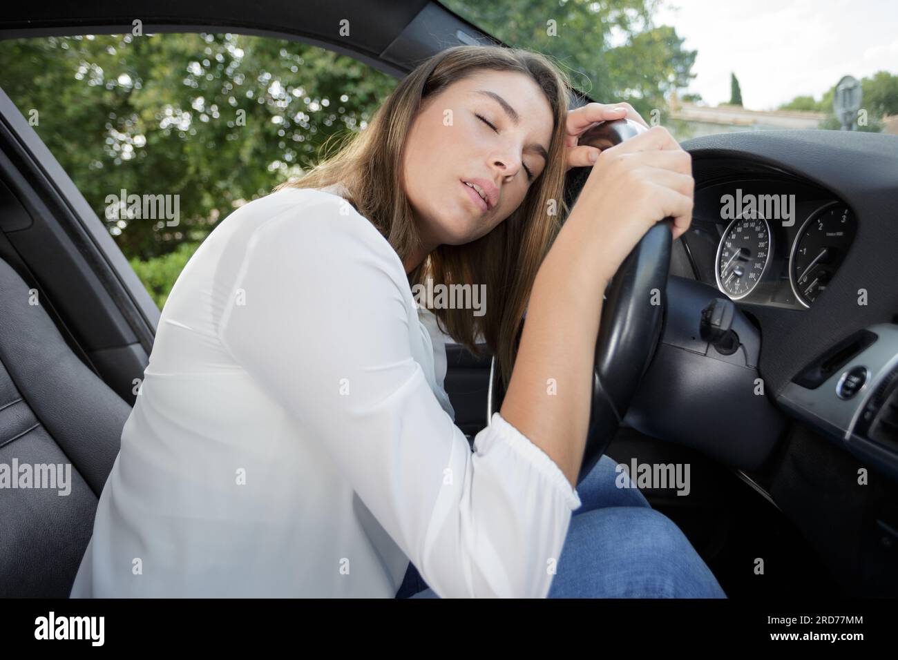 woman is resting in the car Stock Photo - Alamy