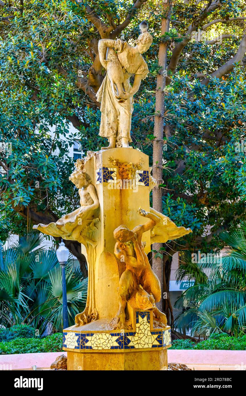 Alicante, Spain, La Aguadora Fountain. The old sculpture is a heritage ...