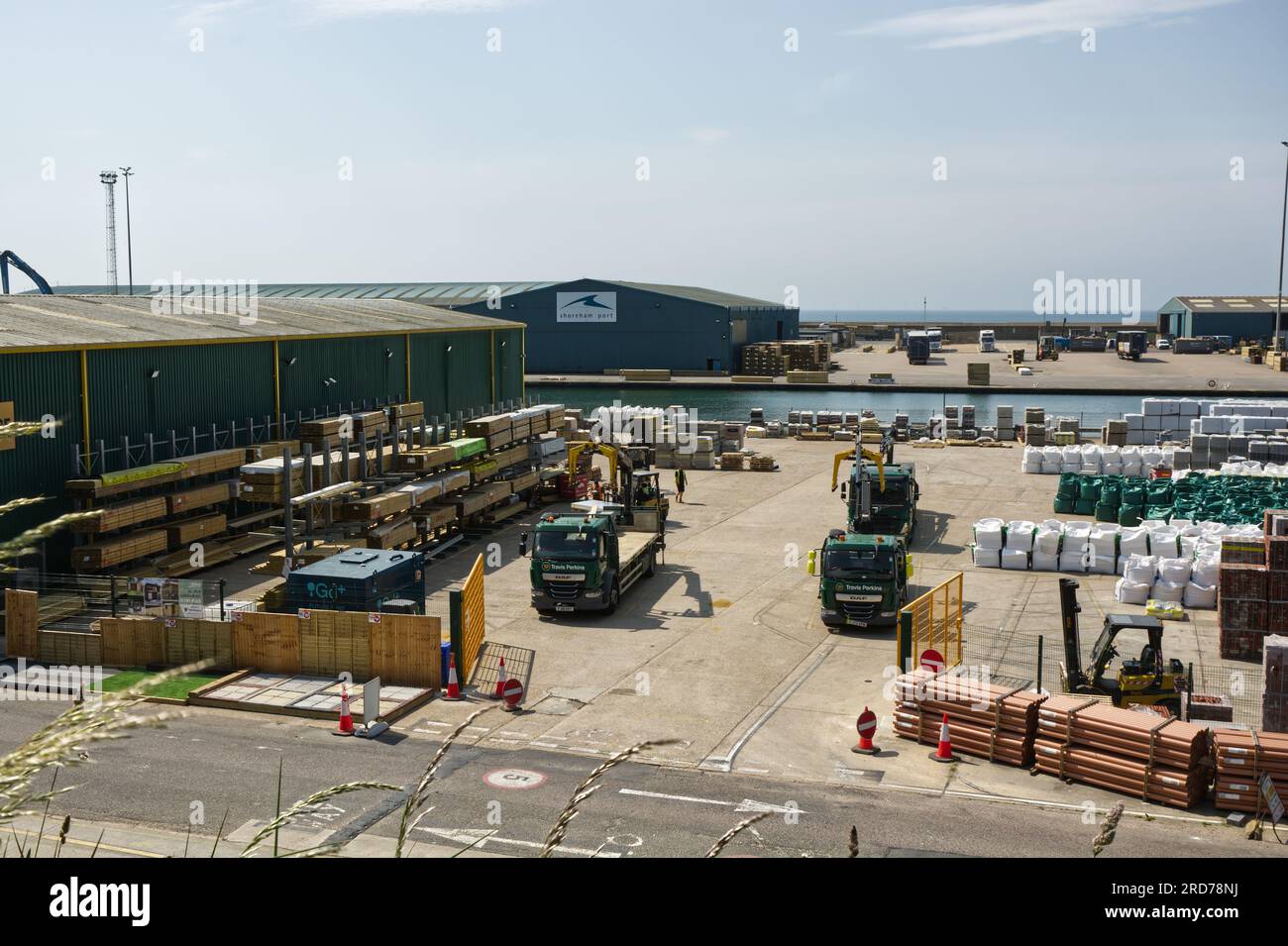 Builders Merchants stockyard on dockside at Shoreham Harbour, West ...