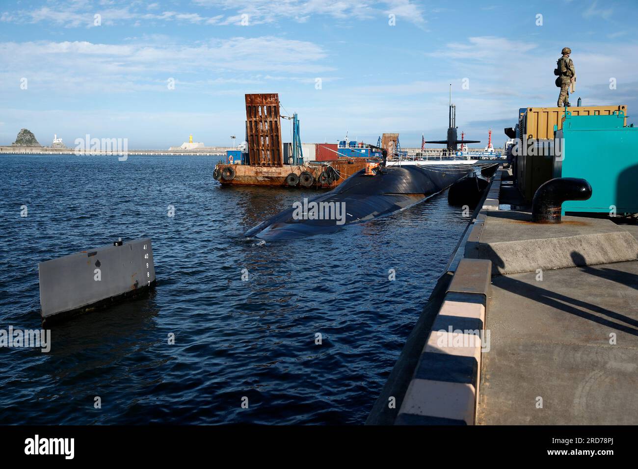 The USS Kentucky, a U.S. nuclear-armed submarine, is anchored at the ...