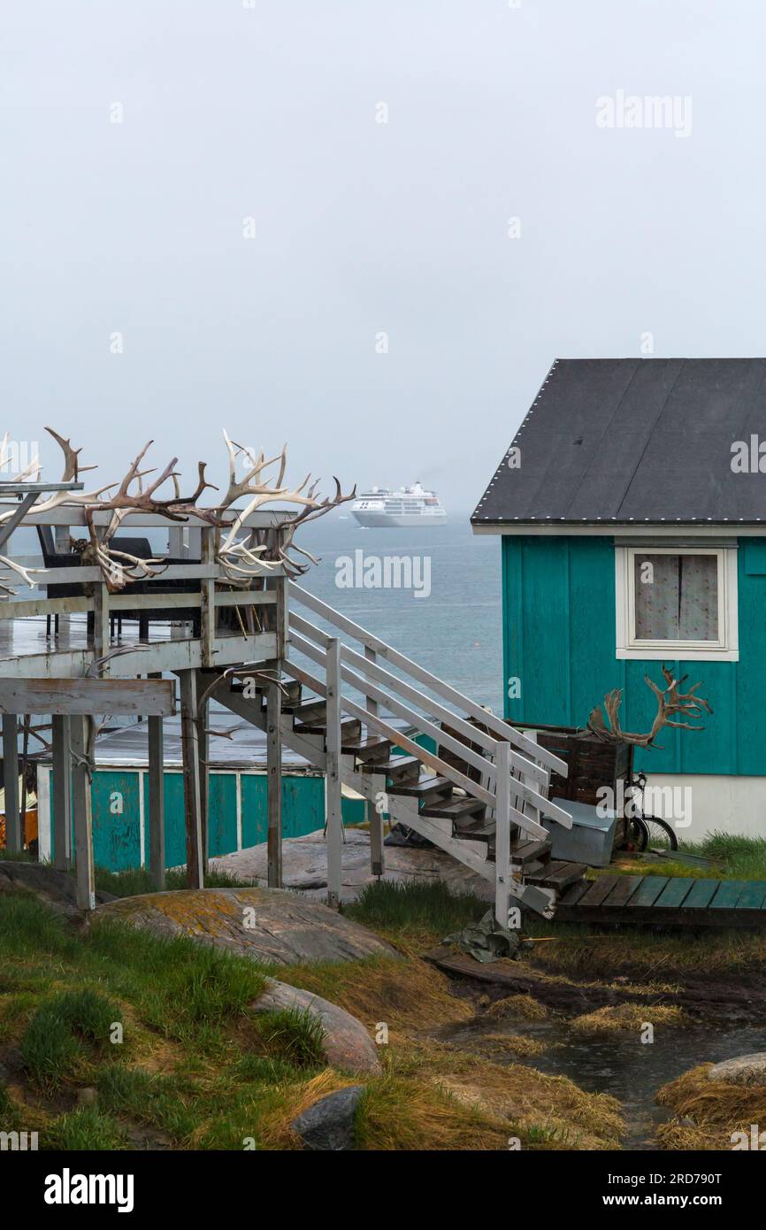 Reindeer antlers hanging by house in settlement at Ilimanaq, West ...