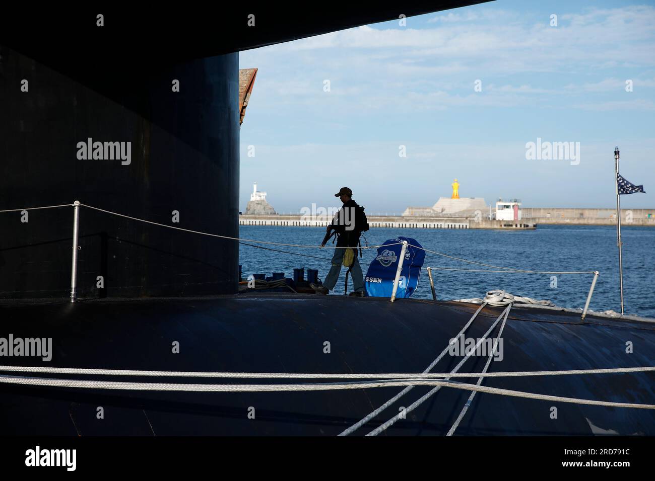 A crew patrols on the deck of the USS Kentucky, a U.S. nuclear-armed ...