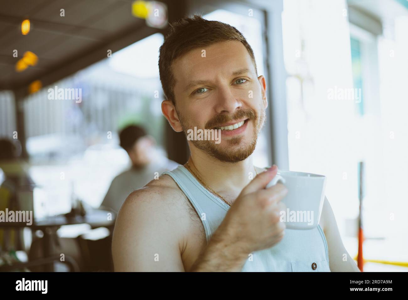 Handsome man cup coffee hi-res stock photography and images - Alamy