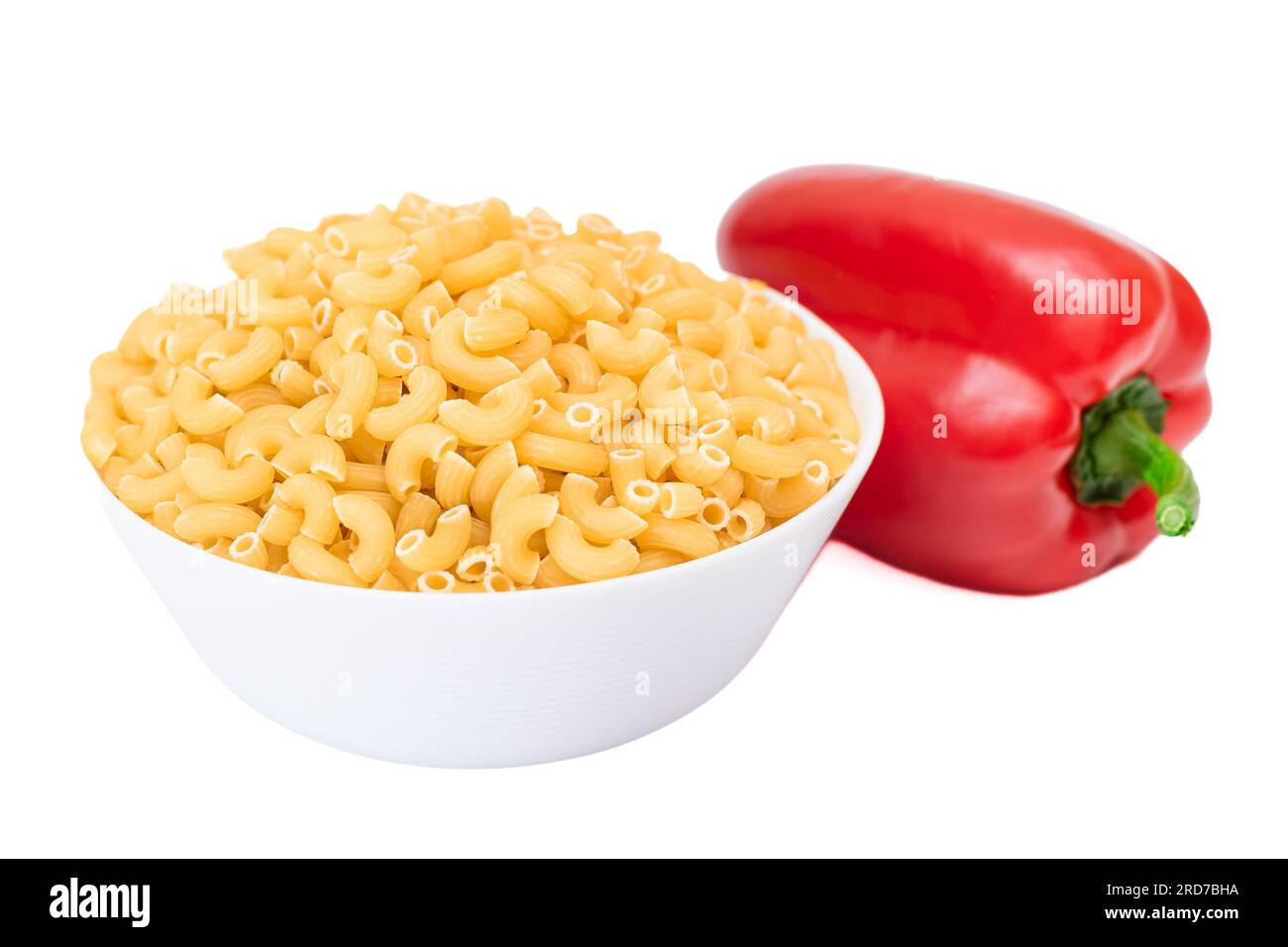 Uncooked Chifferi Rigati Pasta in White Cup with Red Bell Pepper ...