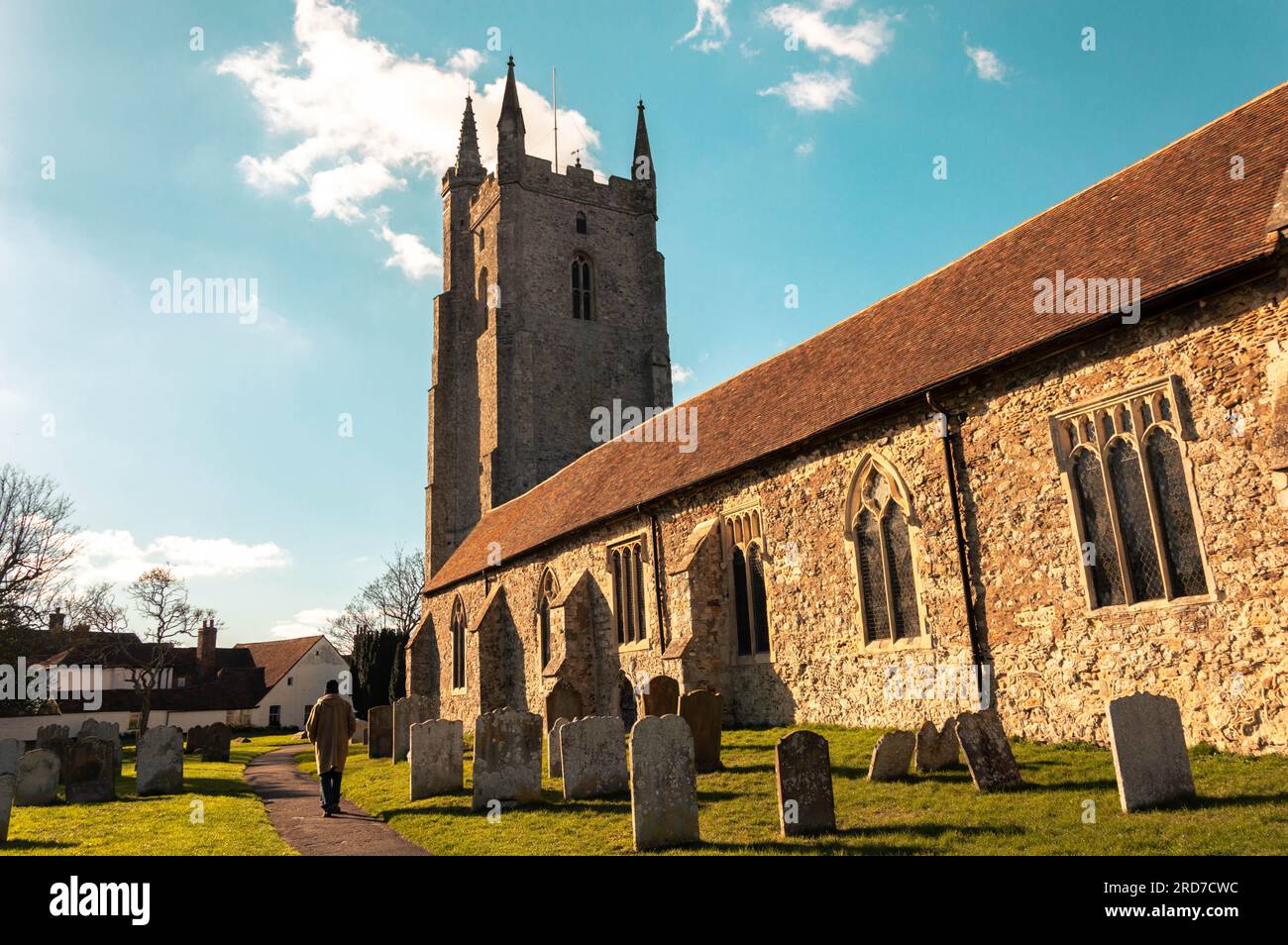 An Old Man Walking Down the Graveyard Path at the Church, Lydd, Kent ...