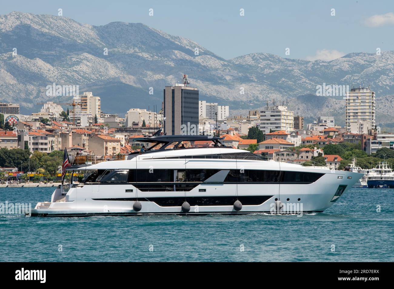 large motorboat at anchor in the bay off split in croatia, powerboat ...