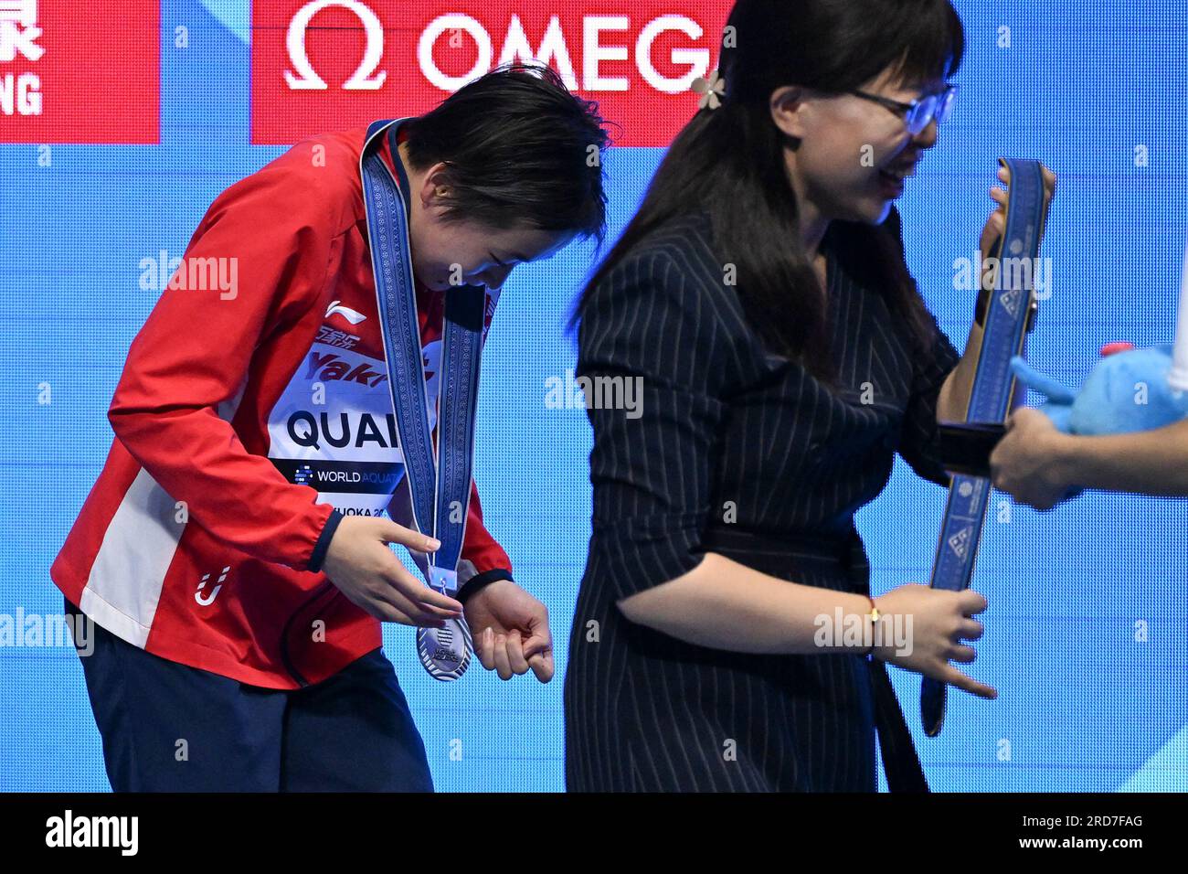Fukuoka, Japan. 19th July, 2023. Quan Hongchan of China reacts during ...