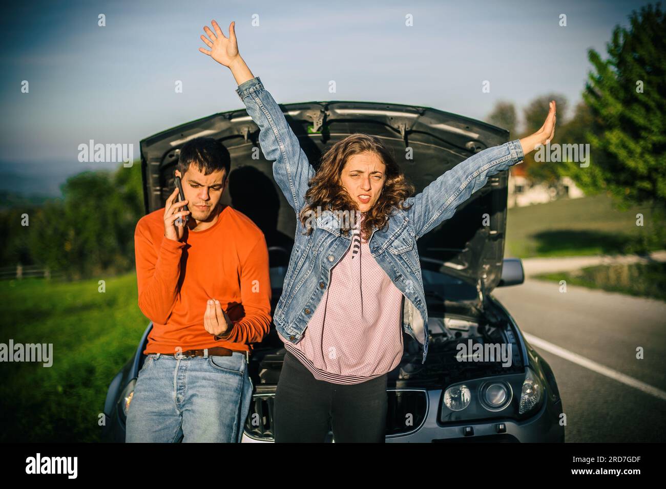 A young couple had a car breakdown on the road. Driver tries to find ...