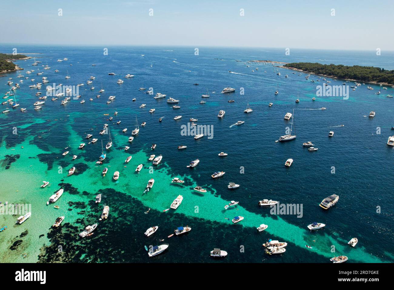 Cannes, France. 14th July, 2023. Tourists between the two islands in ...