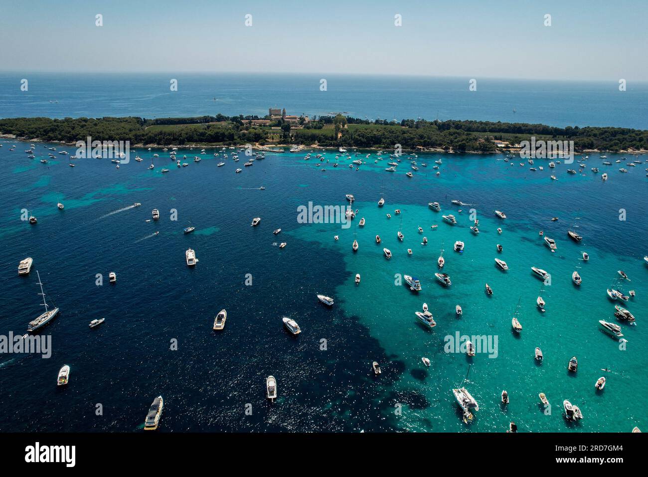 Cannes, France. 14th July, 2023. Tourists between the two islands in ...