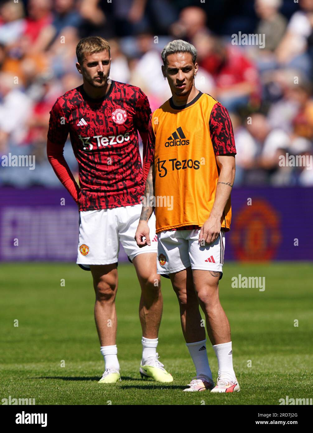 Manchester United's Mason Mount (left) and Antony warm up prior to the ...