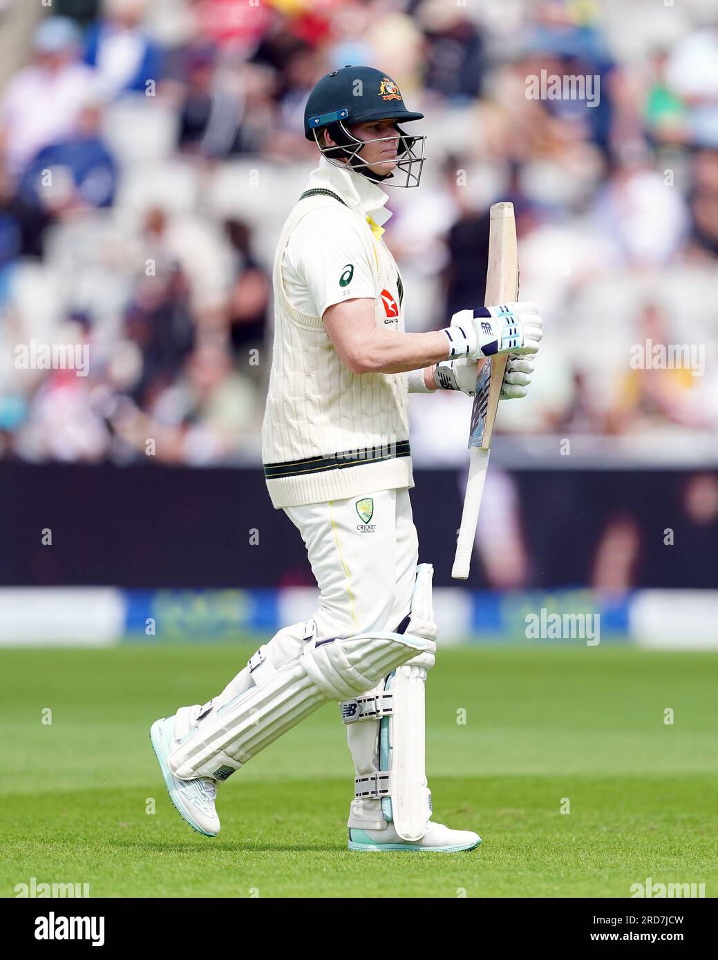 Australia's Steve Smith walks off the pitch after losing his wicket ...
