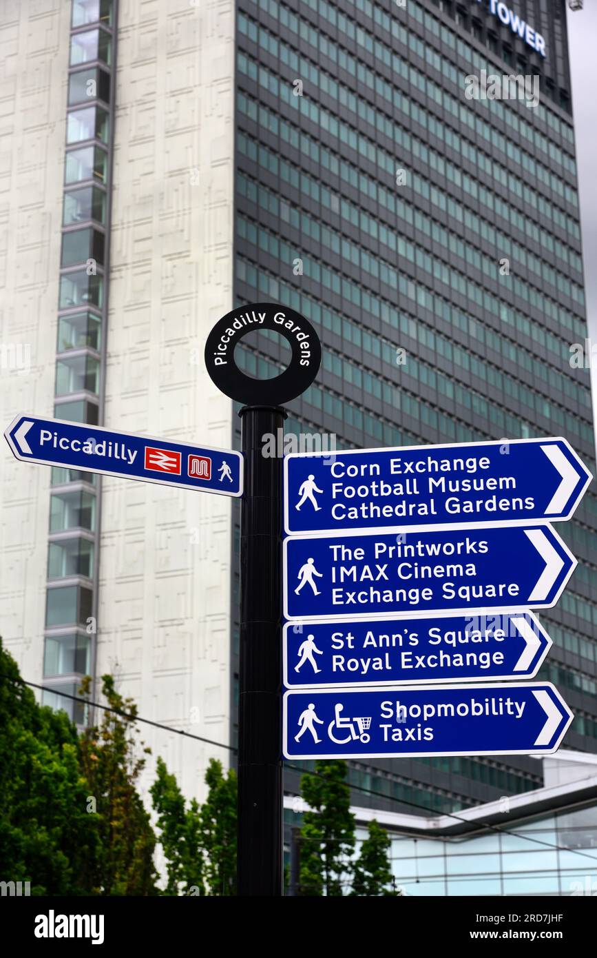 Manchester city centre signpost Stock Photo - Alamy