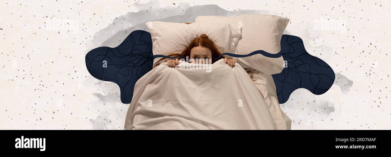 Young girl lying in bed, crying and feeling scared. Suffering from ...