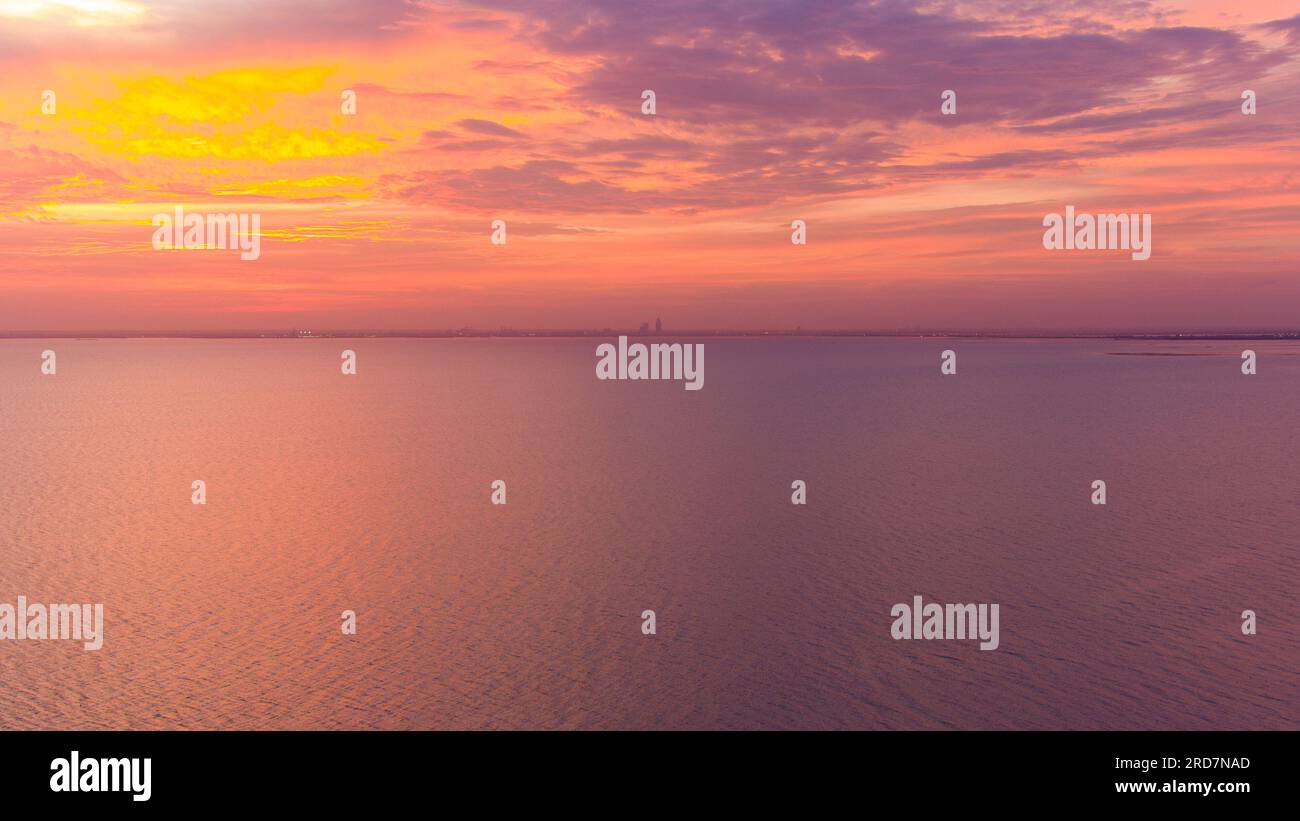 Pink sunset seaside town bay hi-res stock photography and images - Alamy