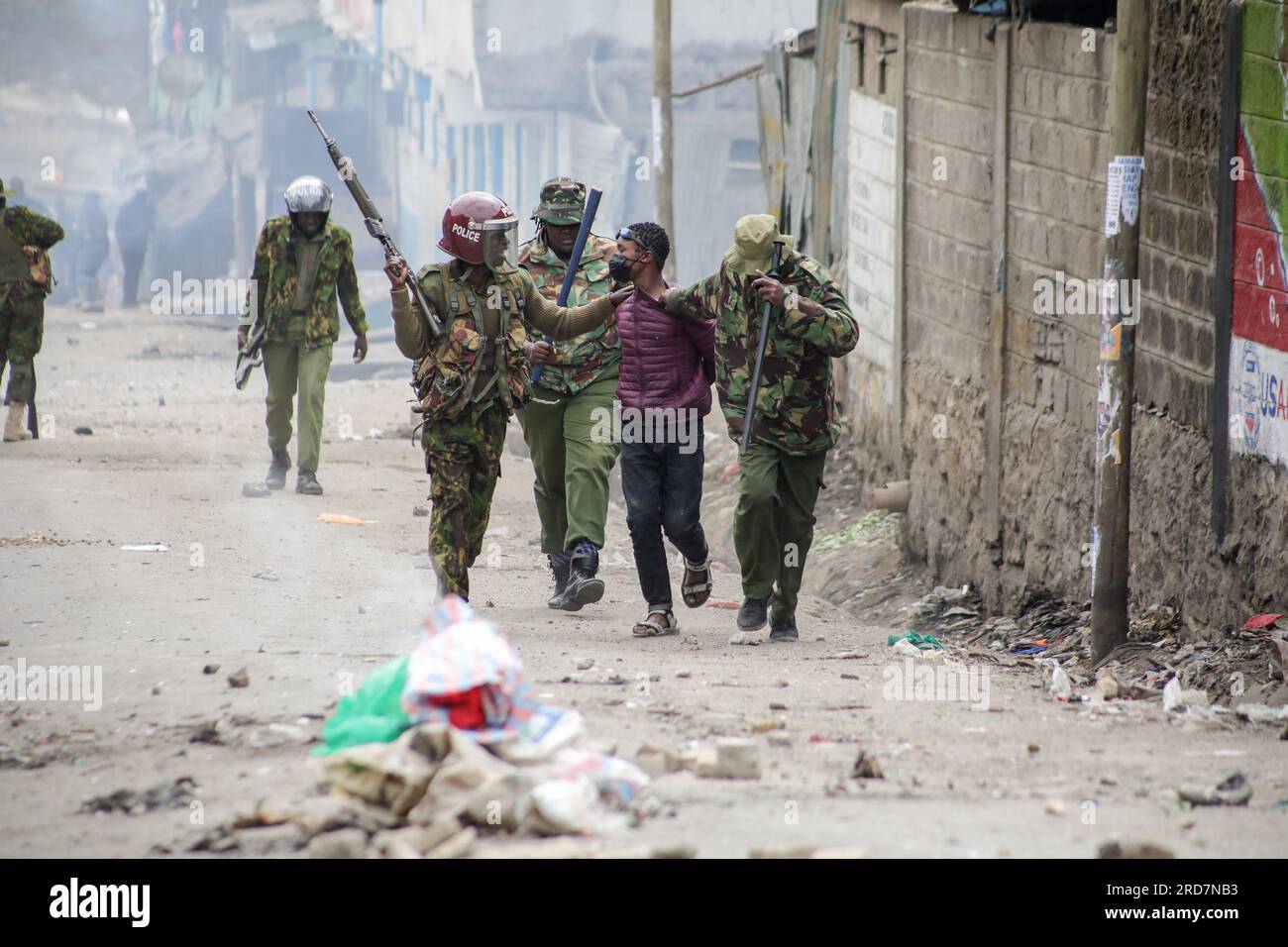 Nairobi, Kenya. 19th July, 2023. Police officers arrest a protester ...
