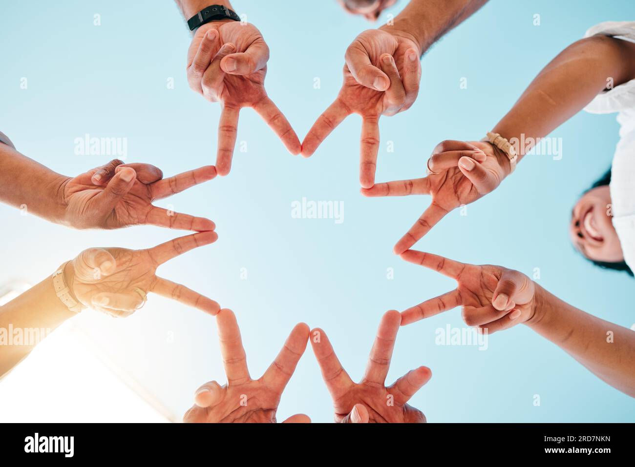 Star, hands and business people with peace sign on sky background for ...