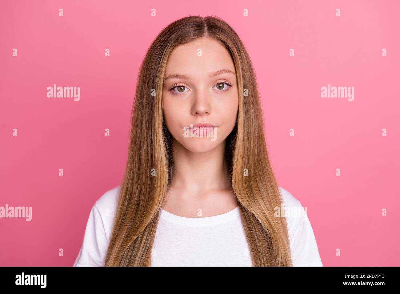 Photo of serious concentrated focused girl calm face look camera ...