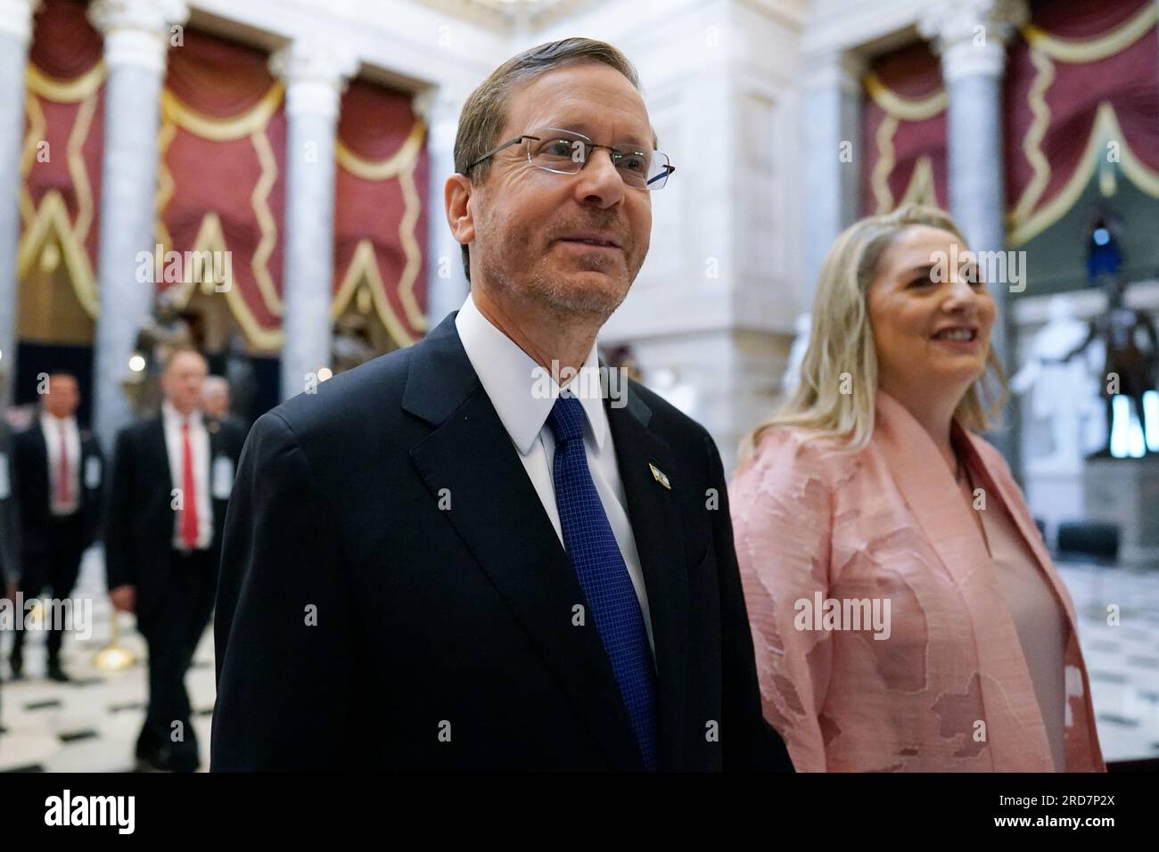 Israeli President Isaac Herzog and first lady Michal Herzog, walk ...