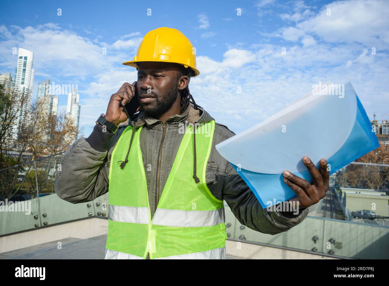 young black man civil engineer builder wearing safety helmet and ...