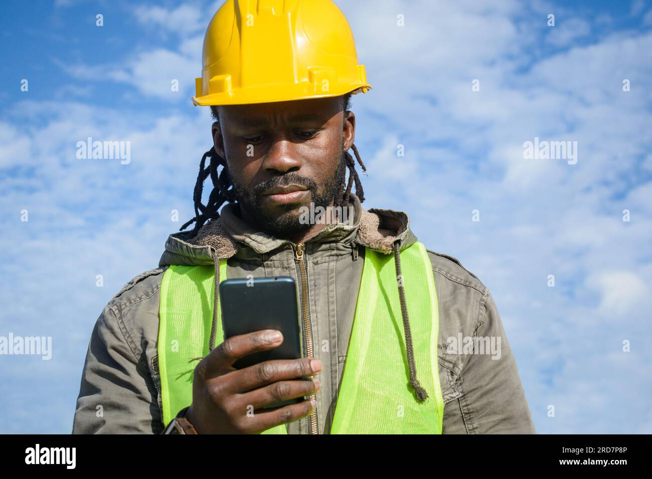 young black man construction worker wearing yellow safety helmet ...