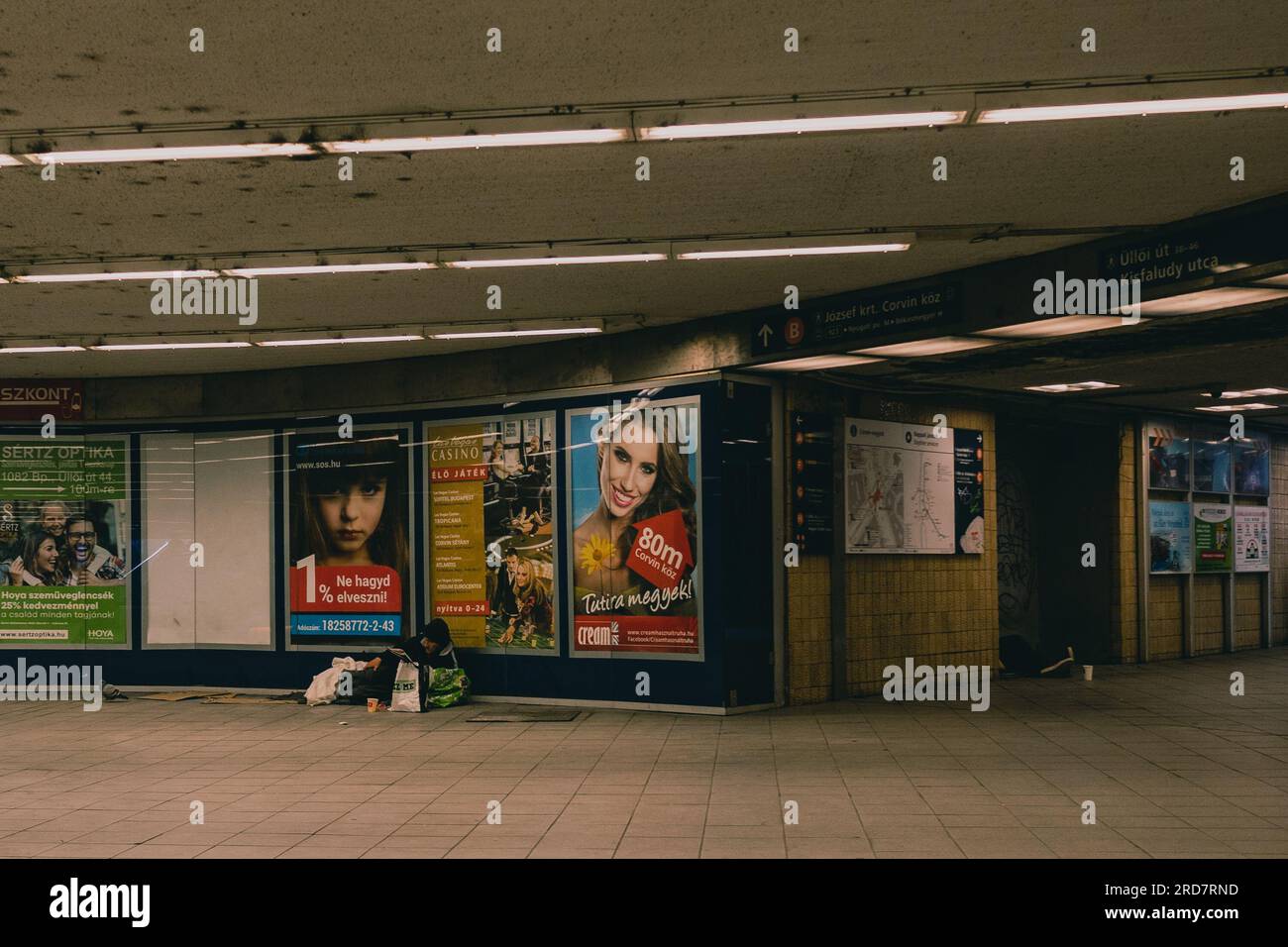 A homeless man seen reading newspaper at the metro station, There has ...