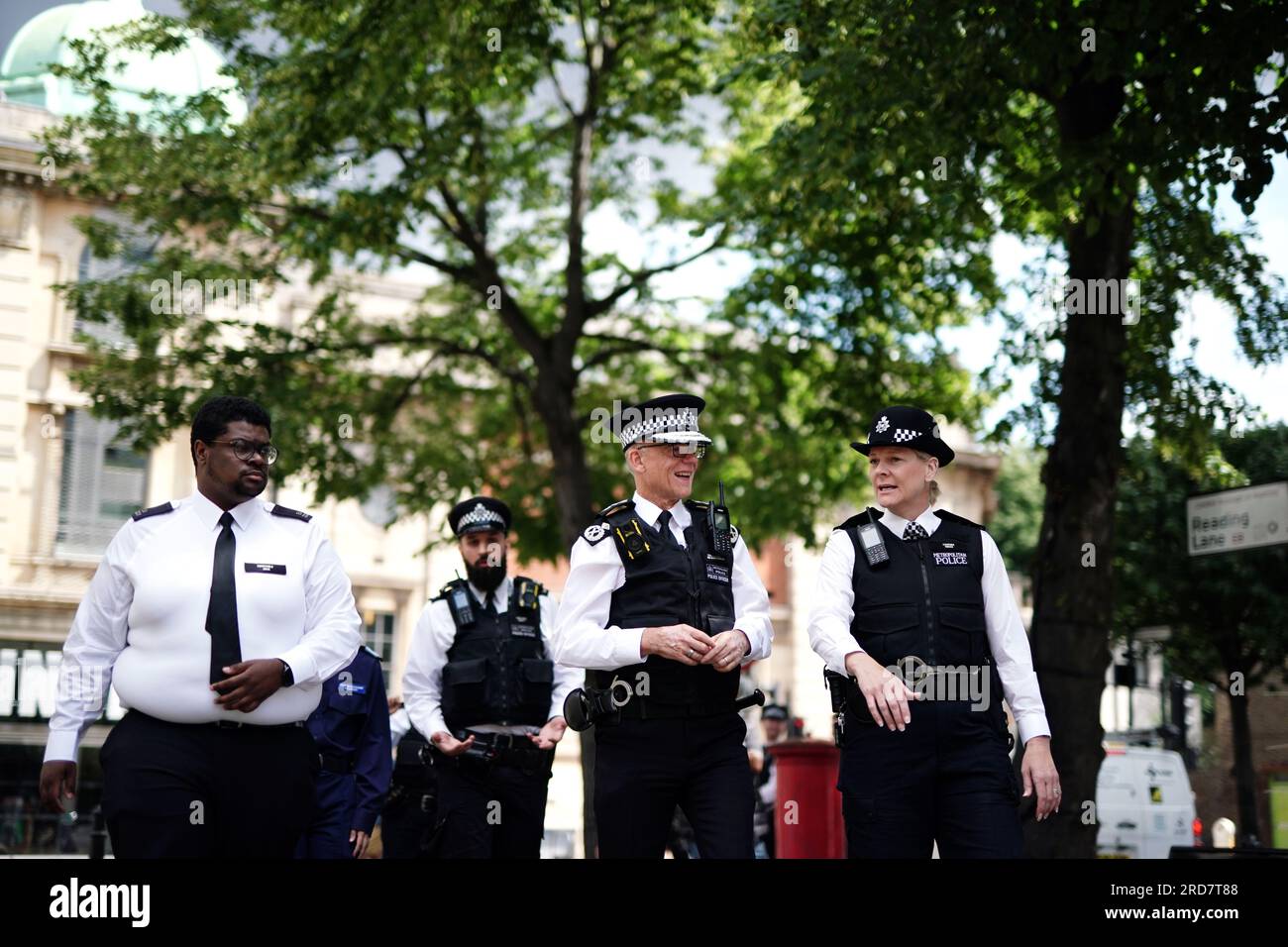 Metropolitan Police Commissioner Sir Mark Rowley (centre) in Hackney ...