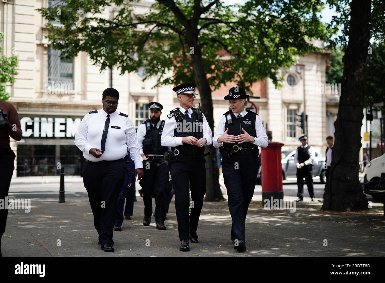 Metropolitan Police Commissioner Sir Mark Rowley (centre) in Hackney ...
