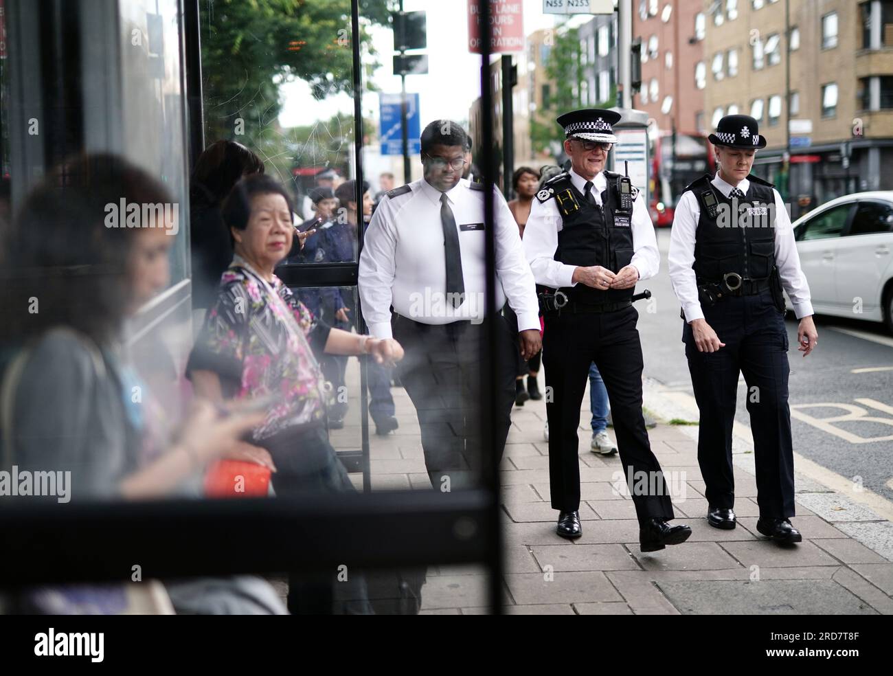 Metropolitan Police Commissioner Sir Mark Rowley (centre) in Hackney ...