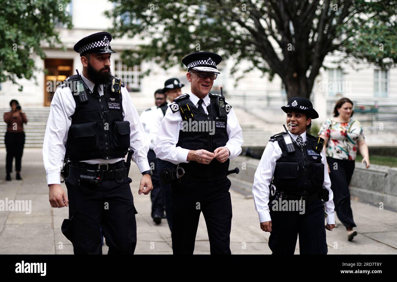 Metropolitan Police Commissioner Sir Mark Rowley (centre) in Hackney ...