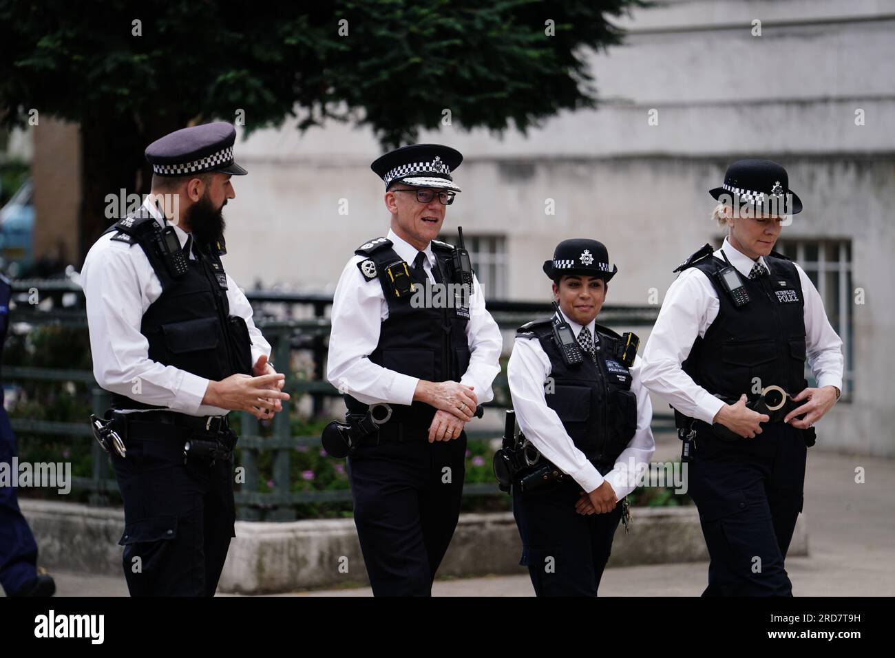 Metropolitan Police Commissioner Sir Mark Rowley (second left) in ...