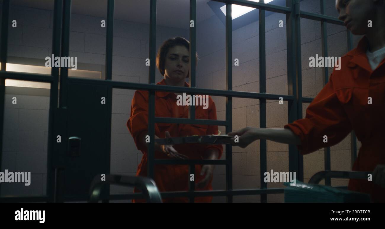 Female inmate sits in her prison cell hi-res stock photography and ...