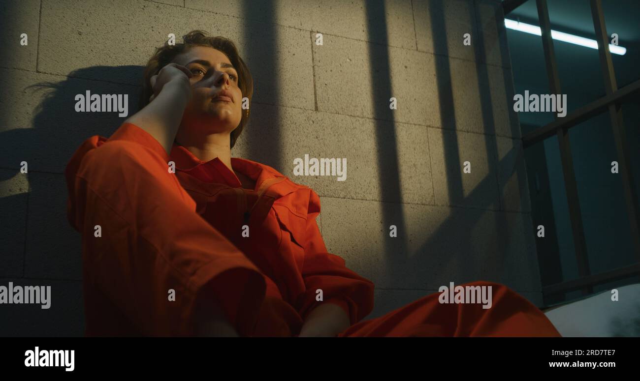 Female inmate sits in her prison cell hi-res stock photography and ...
